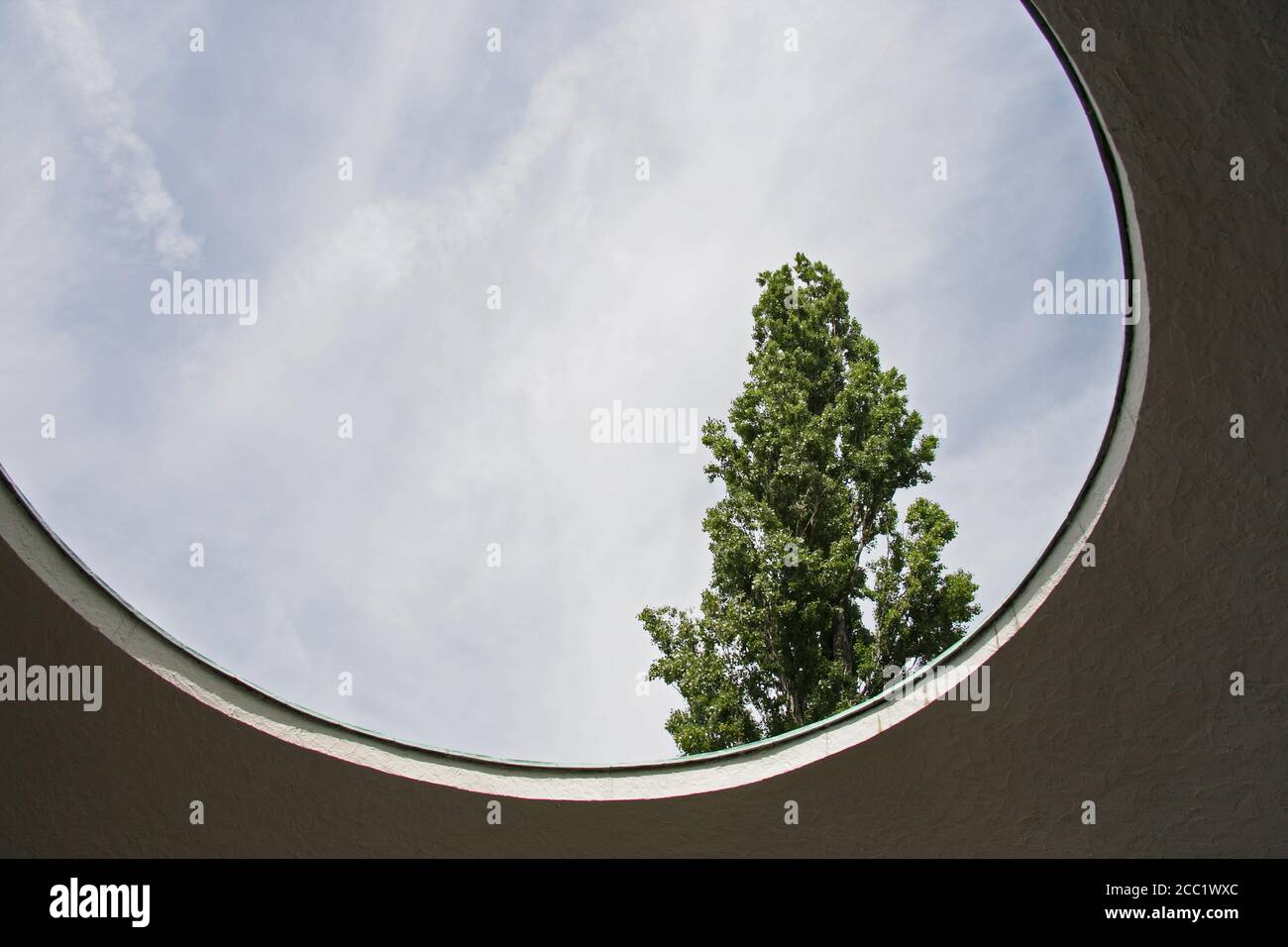 Through the round window hi-res stock photography and images - Alamy