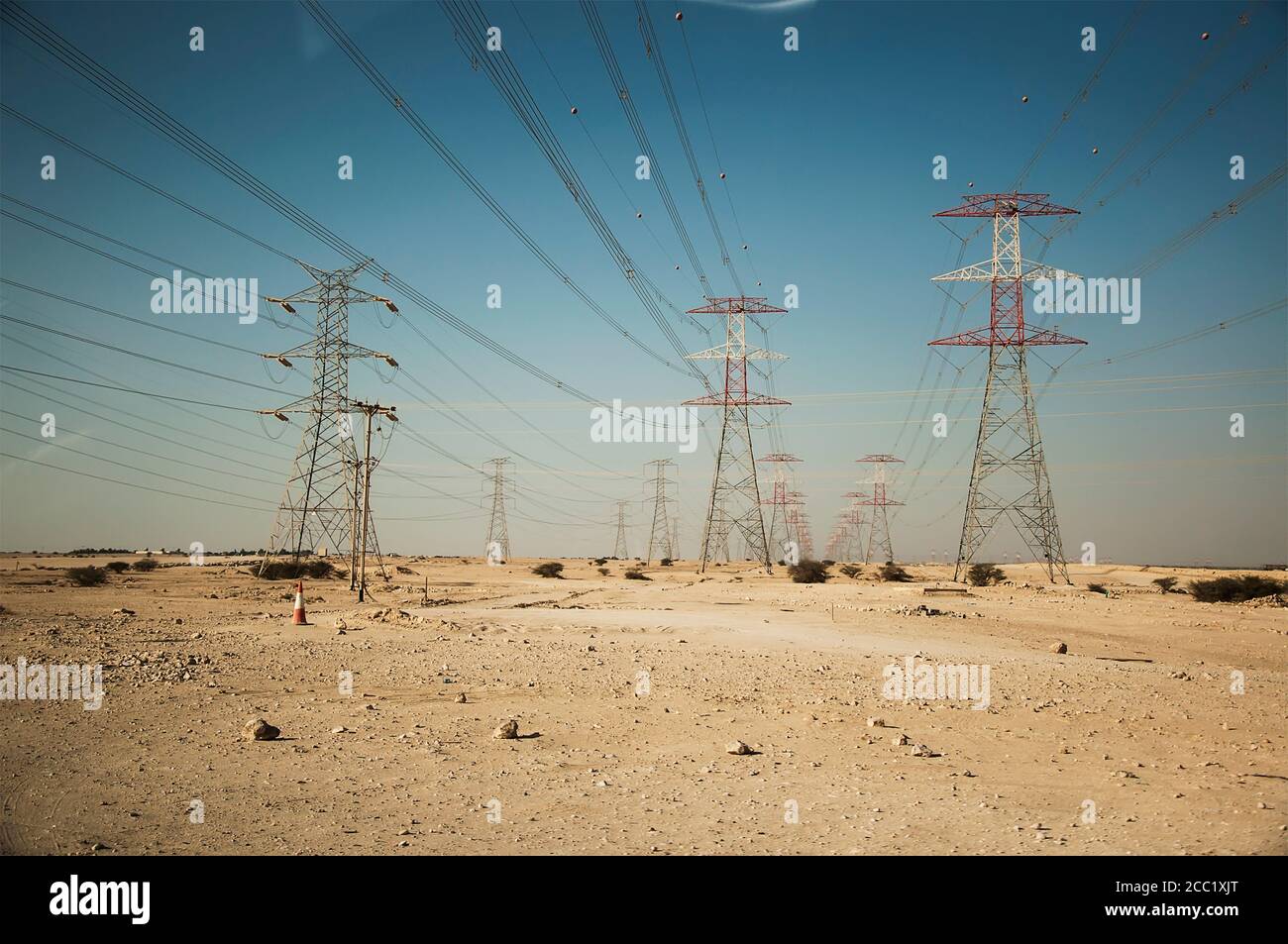 Qatar, Doha, Power poles in desert Stock Photo - Alamy