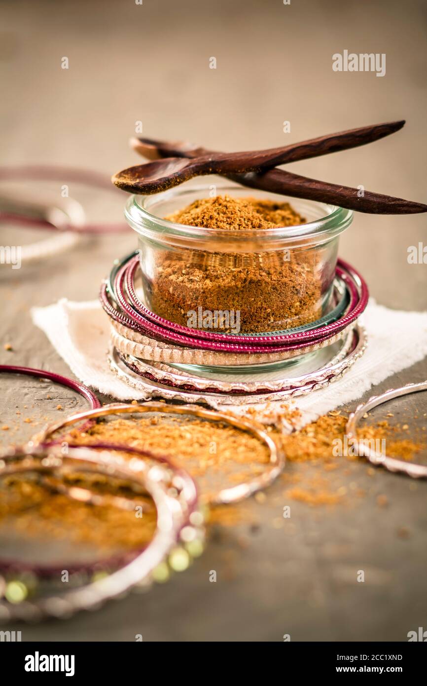 Indian bangles with jar of garam masala and wooden spoon hi-res stock ...