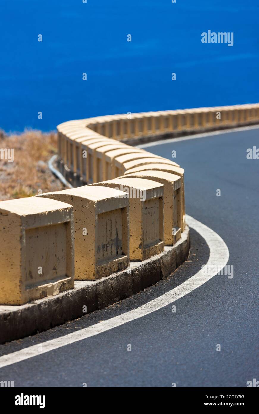 Spain, Road boundary of a Curvy mountain Stock Photo - Alamy