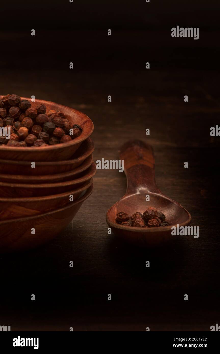 Red pepper in bowl against black background hi-res stock photography ...