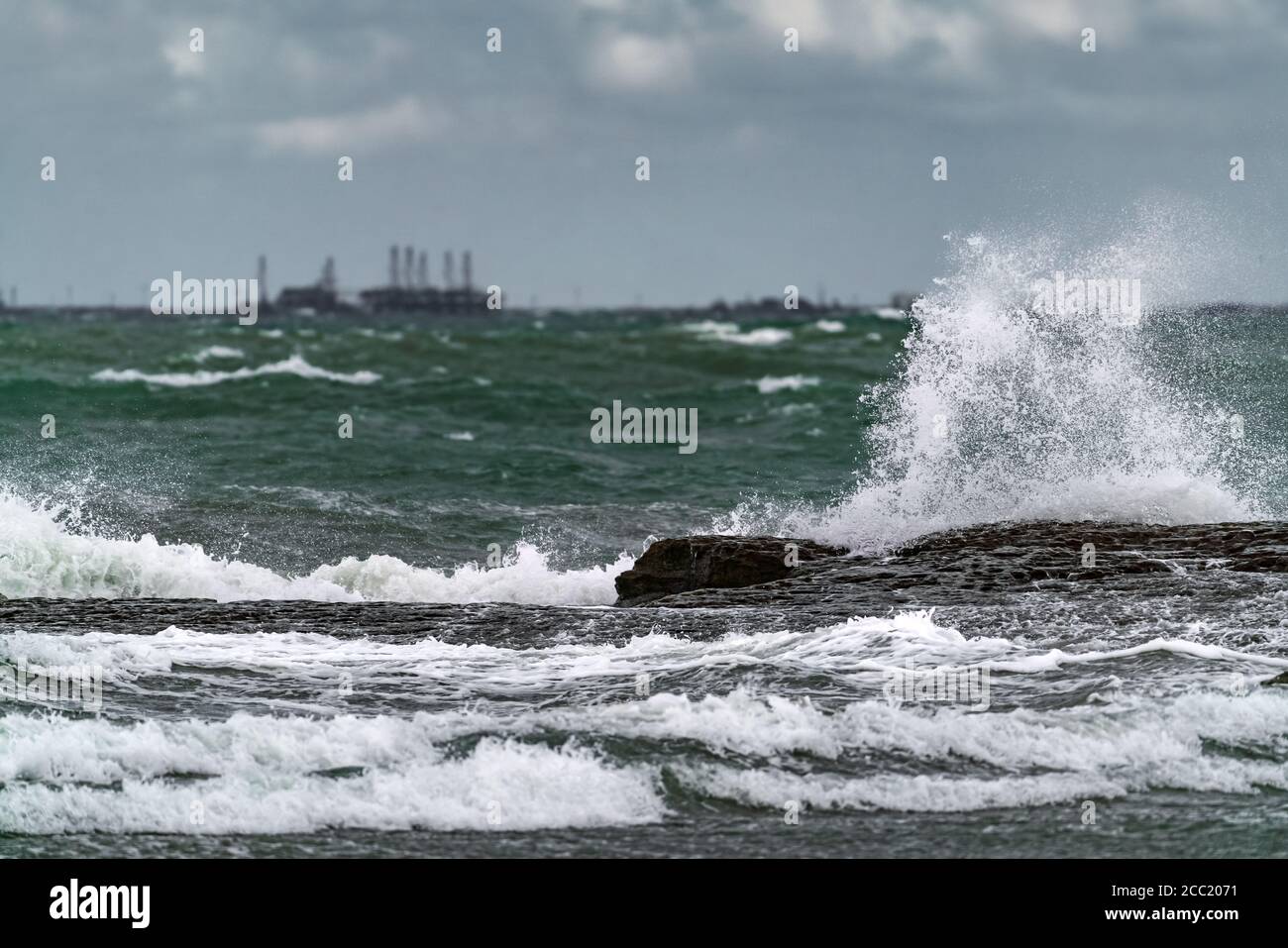 Big waves breaking coastal rocks Stock Photo - Alamy