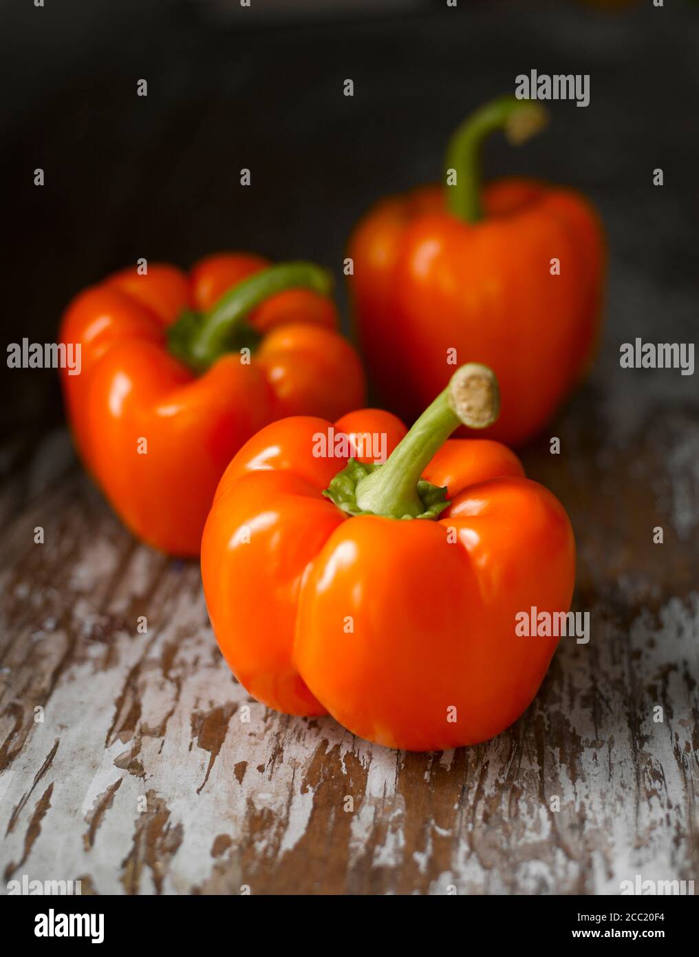 Orange bell peppers Stock Photo - Alamy
