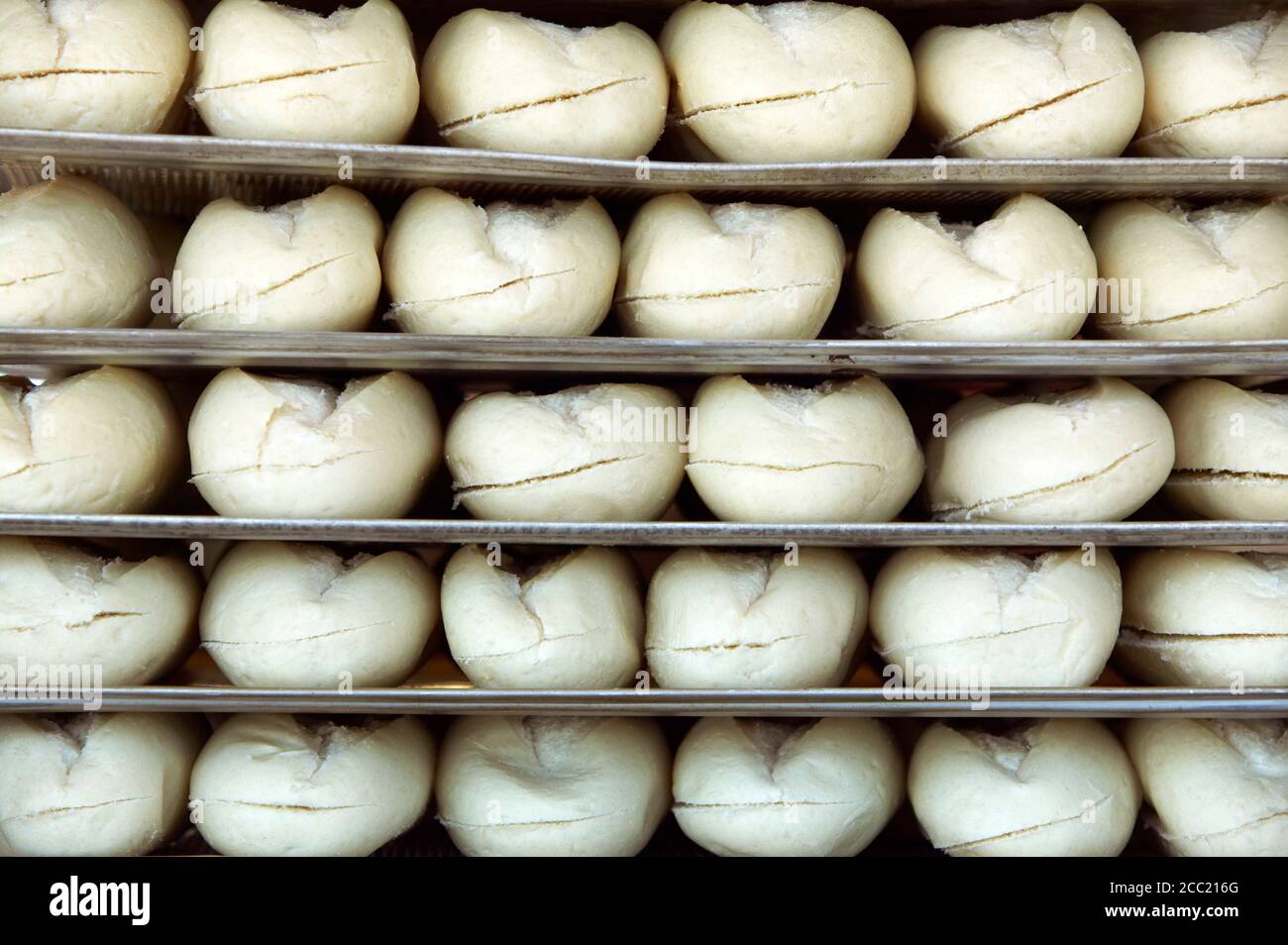 Pile of bread rolls, close up Stock Photo - Alamy