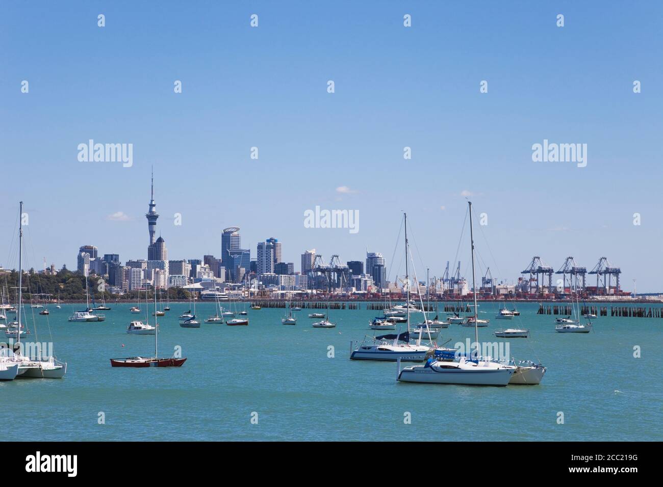 New Zealand, Auckland, View of city and Container Harbour Terminals ...