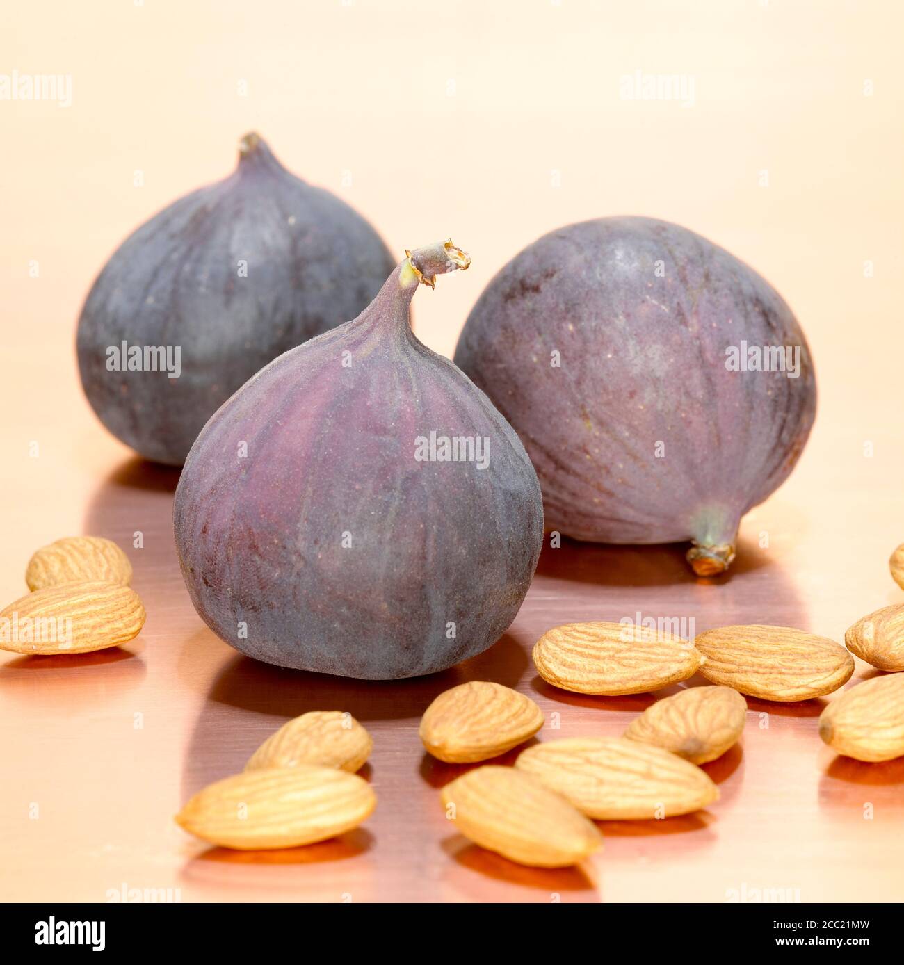 Figs and almonds hi-res stock photography and images - Alamy