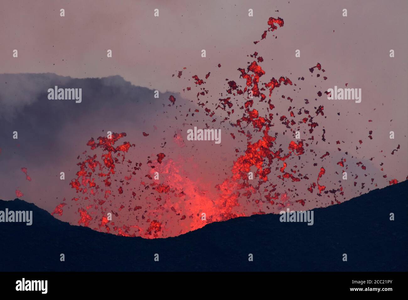 View of lava erupting from nyamuragira volcano hi-res stock photography ...