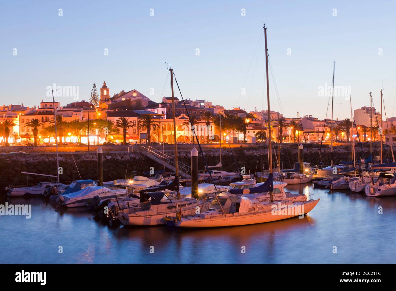 Portugal, Lagos, View of sailing yachts and city in background Stock ...