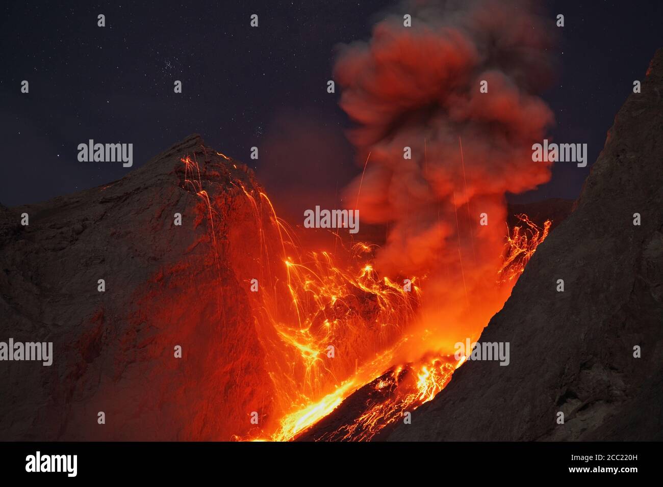 Indonesia, View of lava erupting from Batu Tara volcano island Stock ...