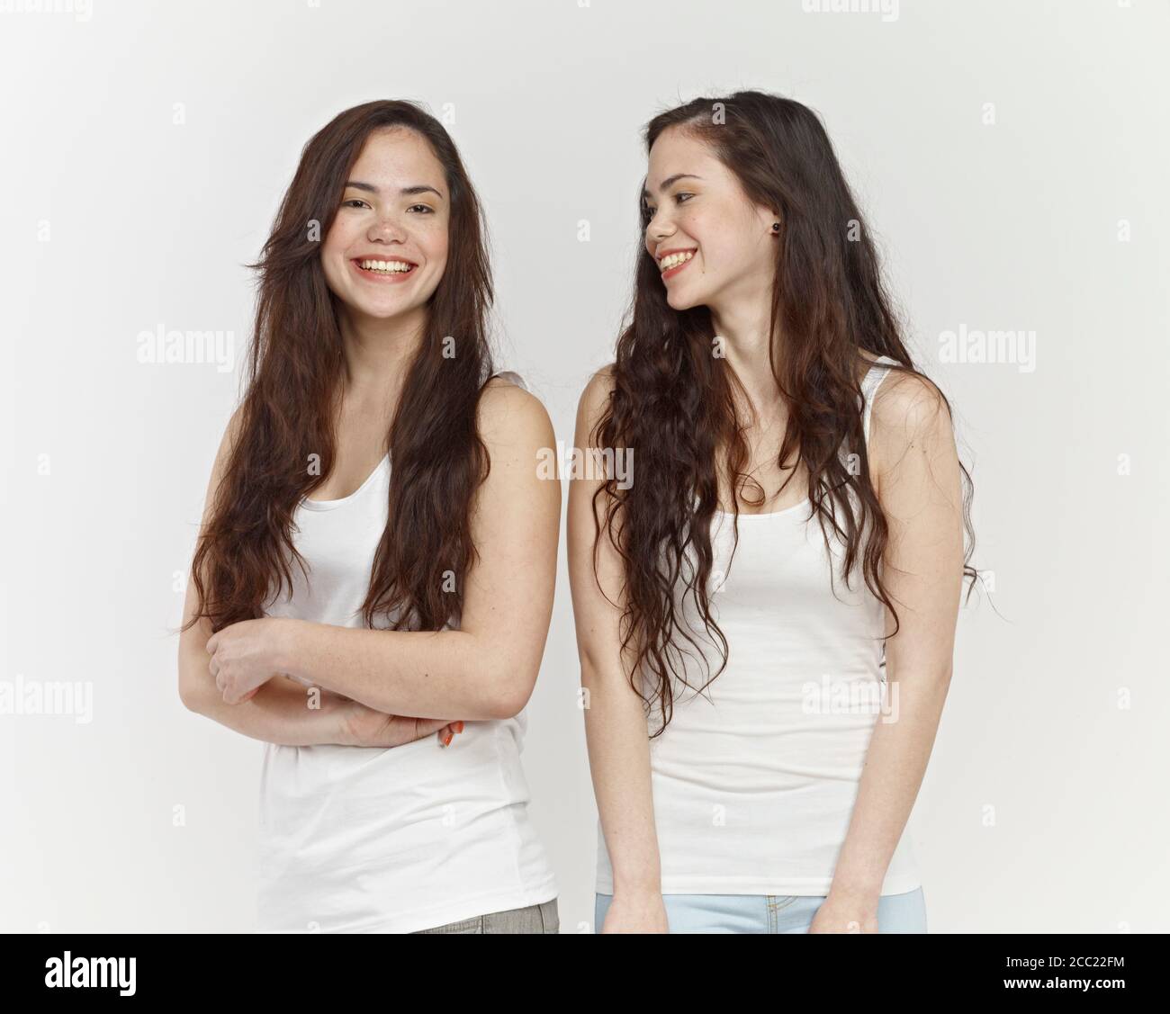 Young women laughing Stock Photo - Alamy