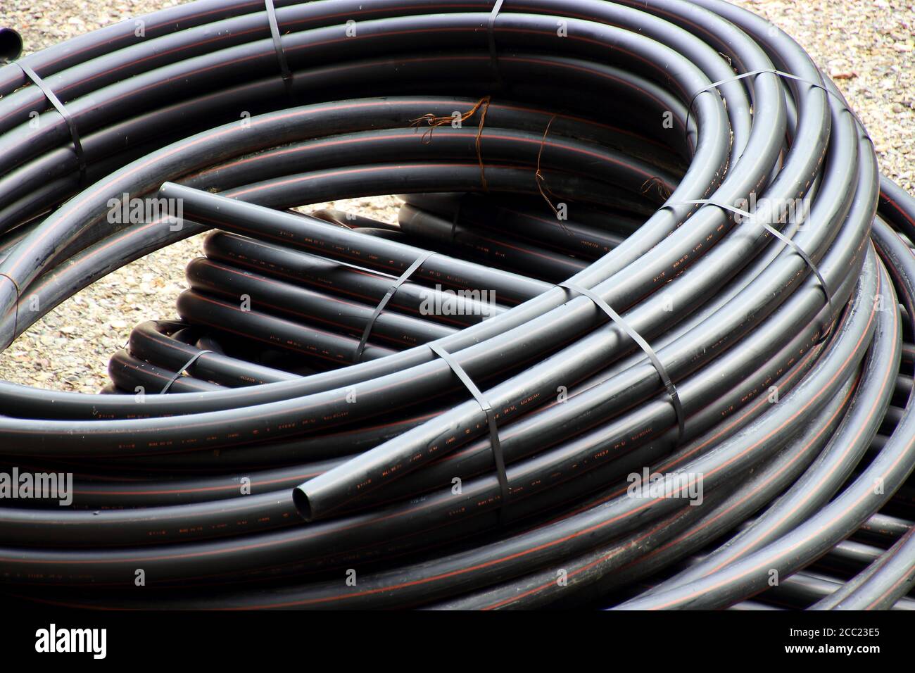 Closeup of a stack of water pipes on top of each other Stock Photo - Alamy