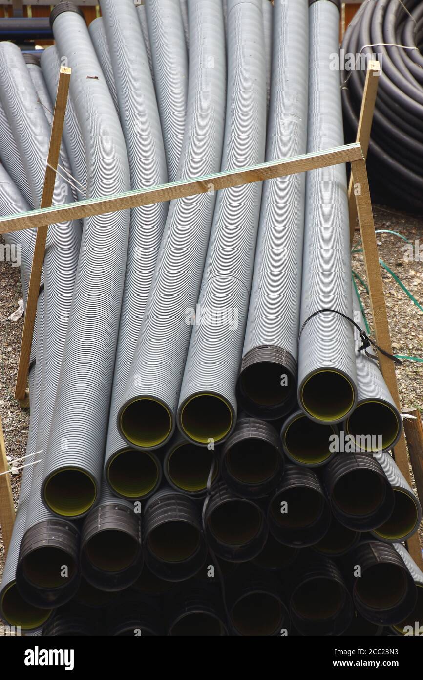 High angle shot of a stack of water pipes on top of each other Stock ...