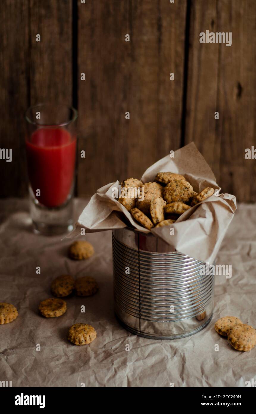 Cheese crackers with blood orange juice,close up Stock Photo - Alamy