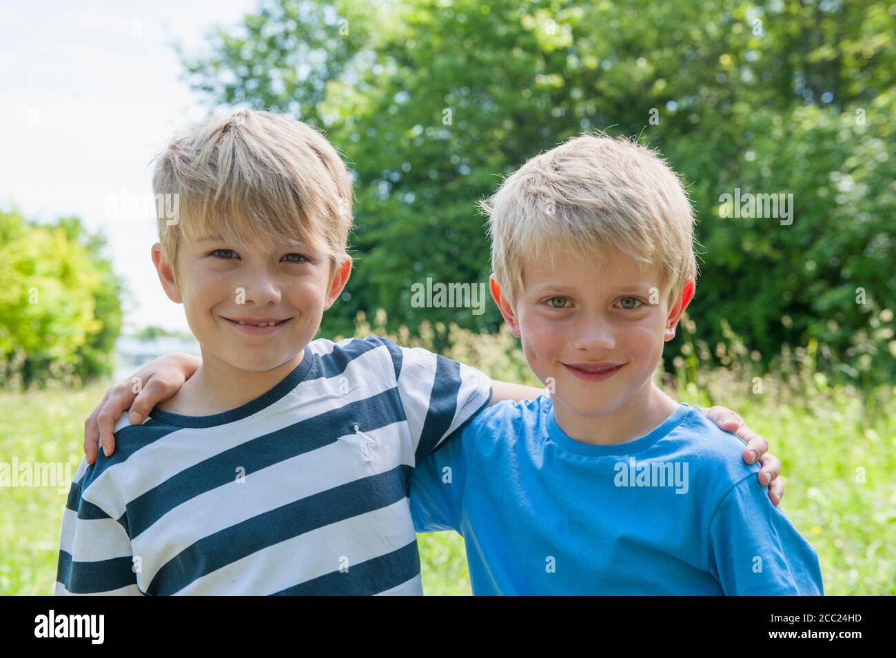 Boys smiling at the camera hi-res stock photography and images - Alamy