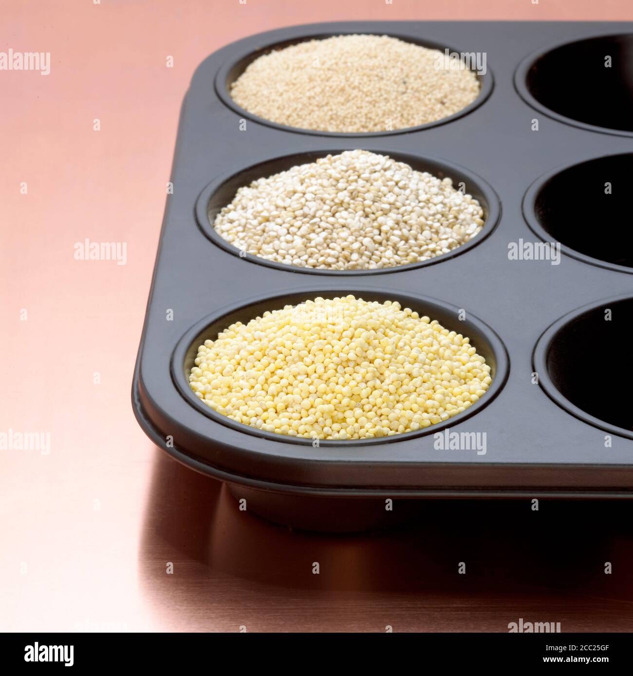 Grains in baking form Stock Photo - Alamy