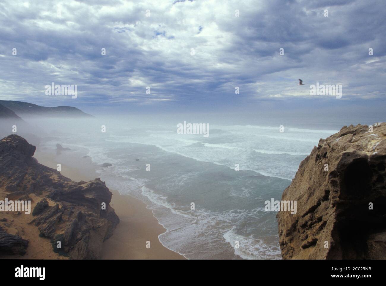 Rock formation by sea Stock Photo - Alamy