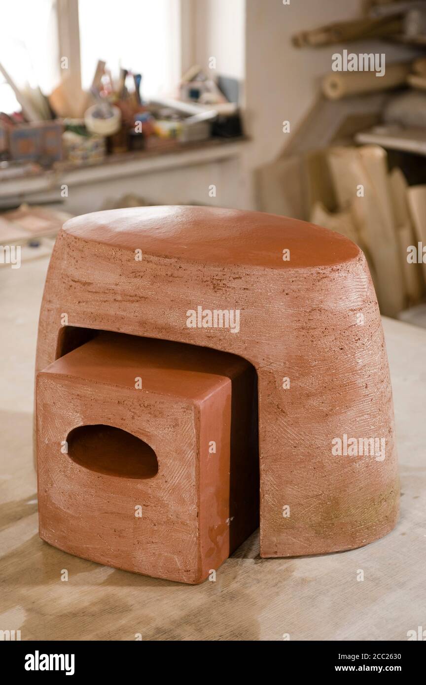 Table and chair of clay on workbench hi-res stock photography and ...