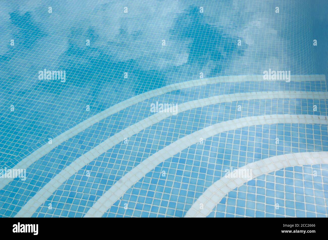 Germany, Reflection of tiles in swimming pool Stock Photo - Alamy