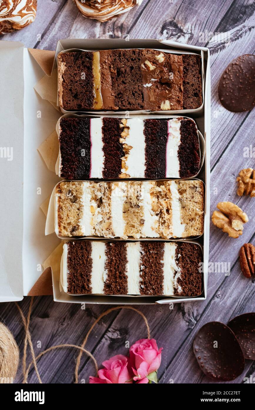 assorted pieces of cake in a box Stock Photo - Alamy