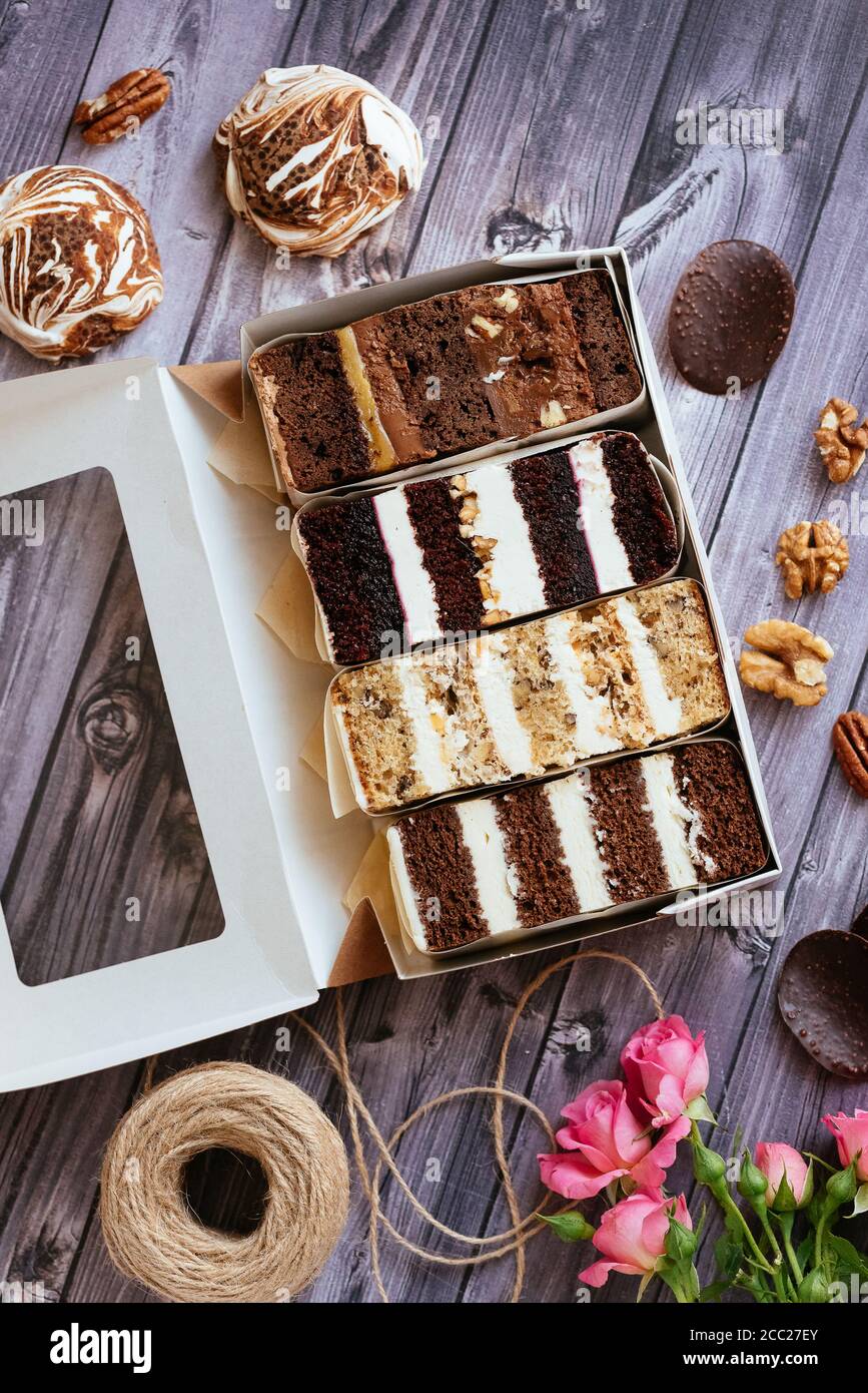 assorted pieces of cake in a box Stock Photo - Alamy