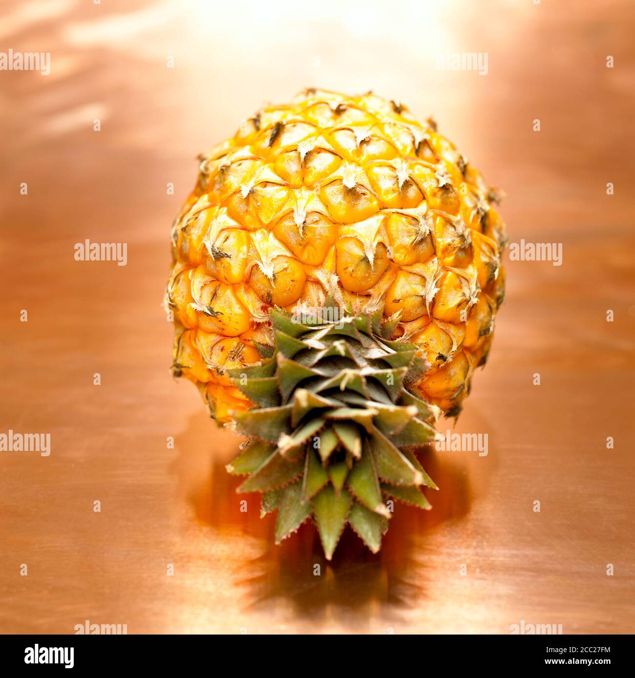 Pineapple on copper Stock Photo - Alamy