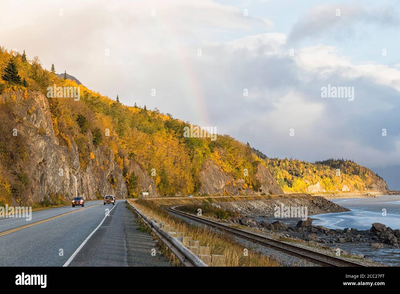 Car passing through turnagain arm along seward highway hi-res stock ...
