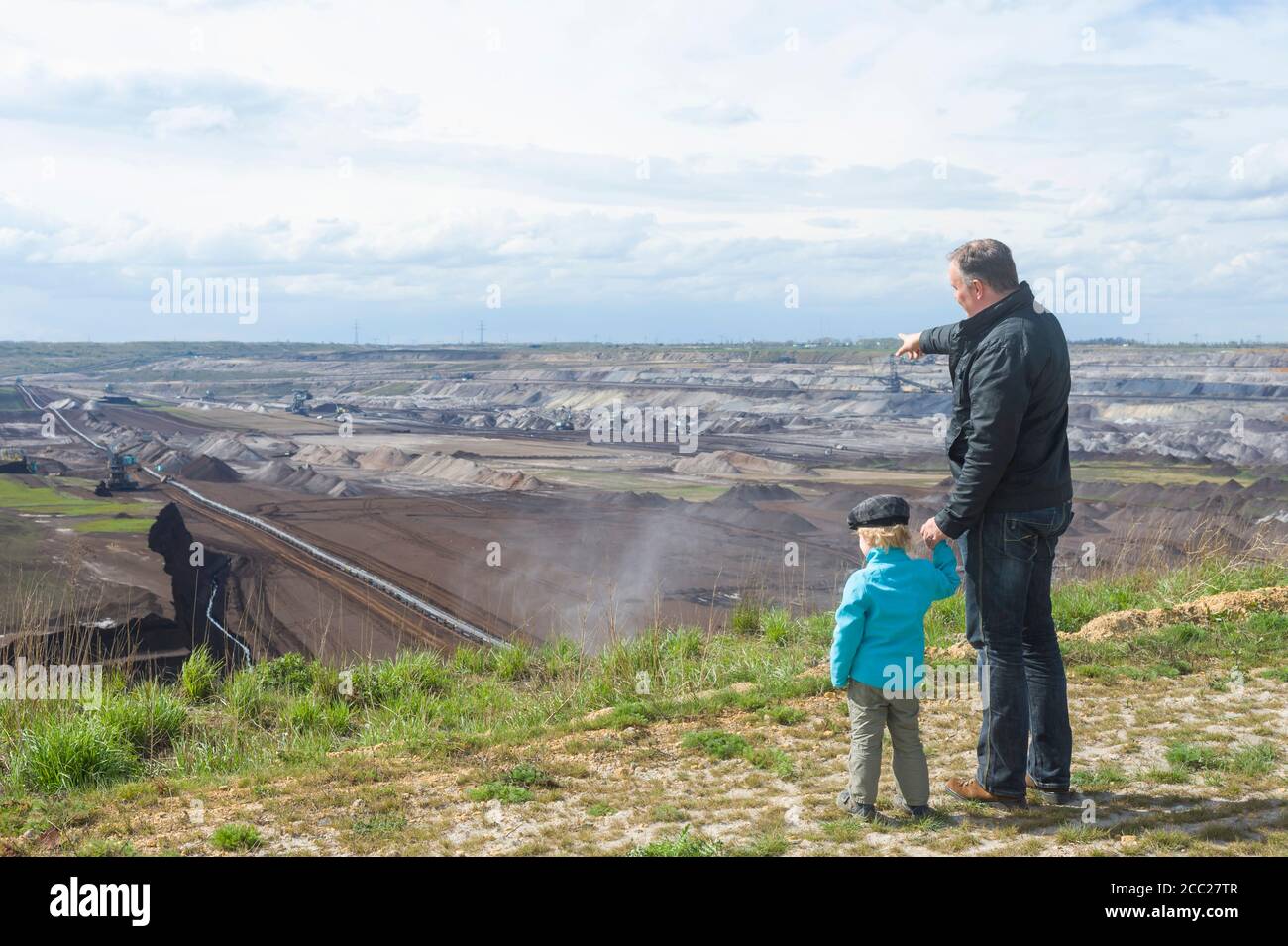 Father showing brown coal mining to son hi-res stock photography and ...