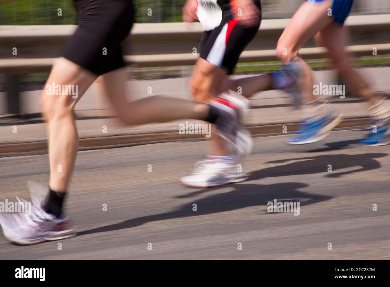 Three men running in marathon hi-res stock photography and images - Alamy