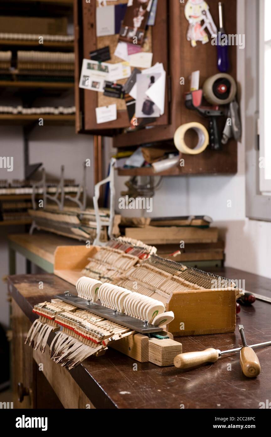 Germany, Bavaria, Piano keys for repairing at workshop Stock Photo - Alamy