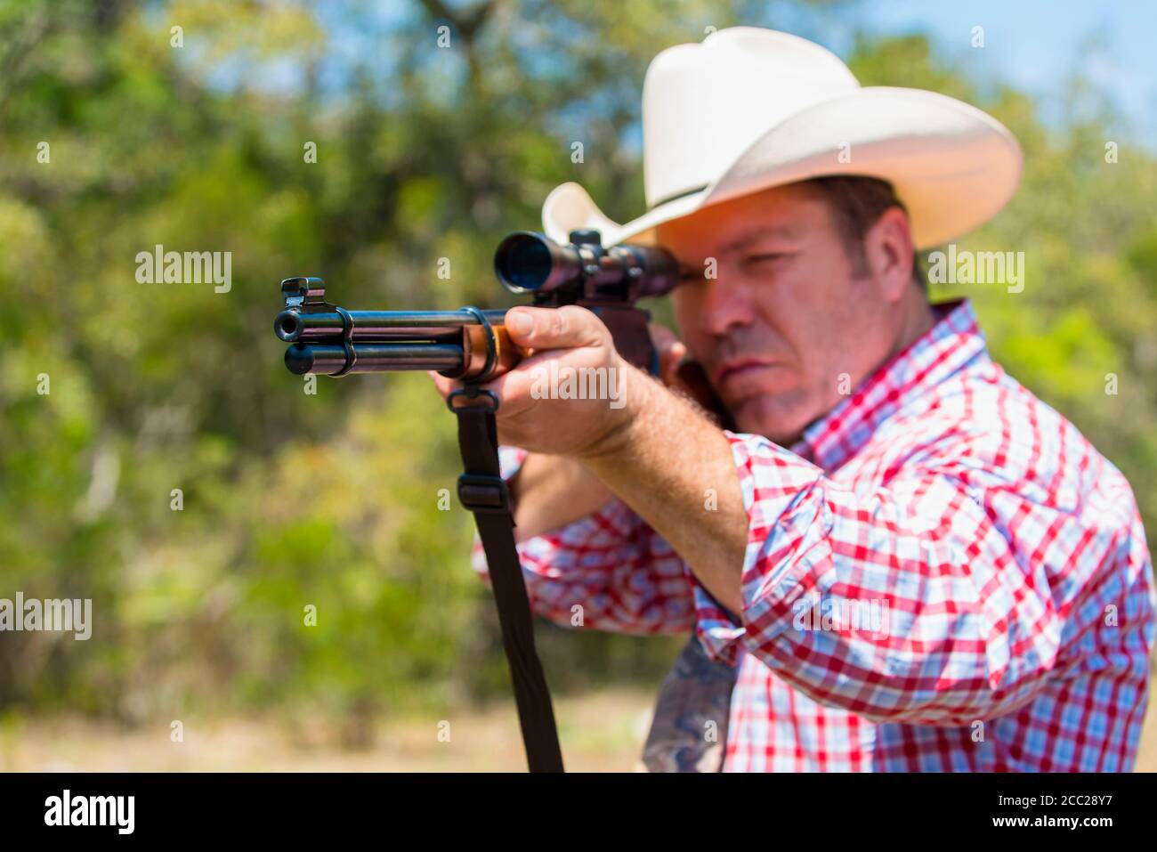 Texas, Cowboy shooting hunting rifle ,close up Stock Photo - Alamy