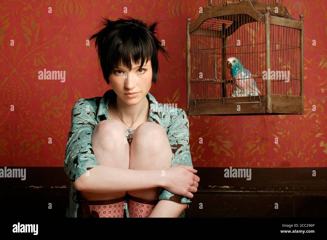 Woman in cage hi-res stock photography and images - Alamy