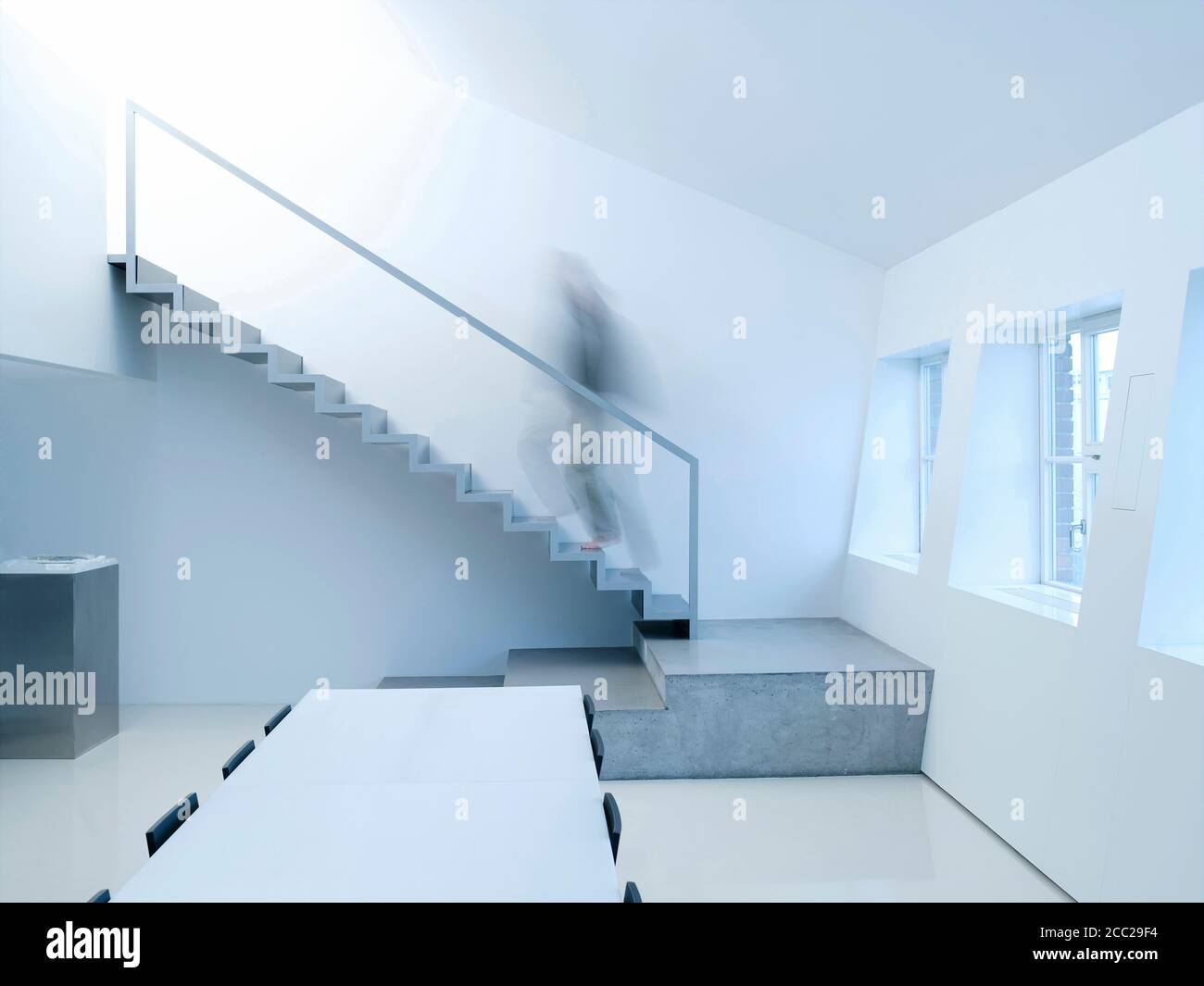 Person walking upstairs, side view Stock Photo - Alamy