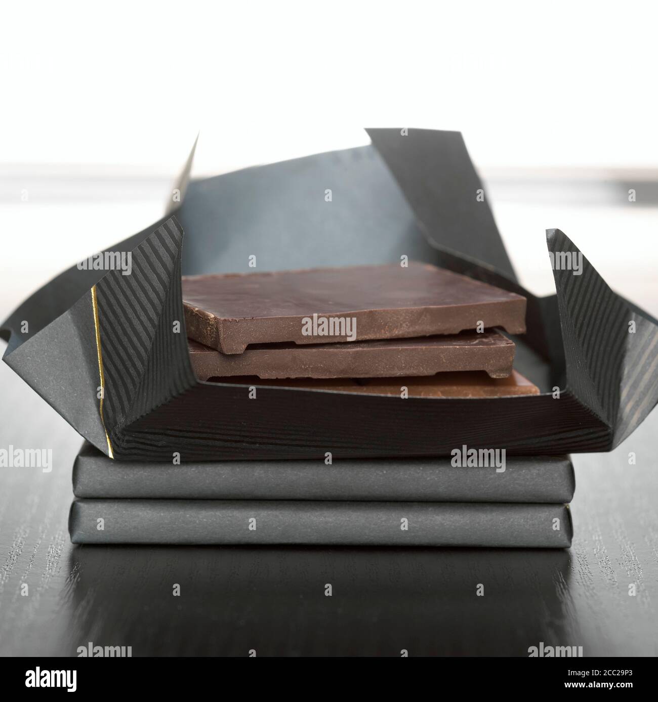 Squares of chocolate hi-res stock photography and images - Alamy