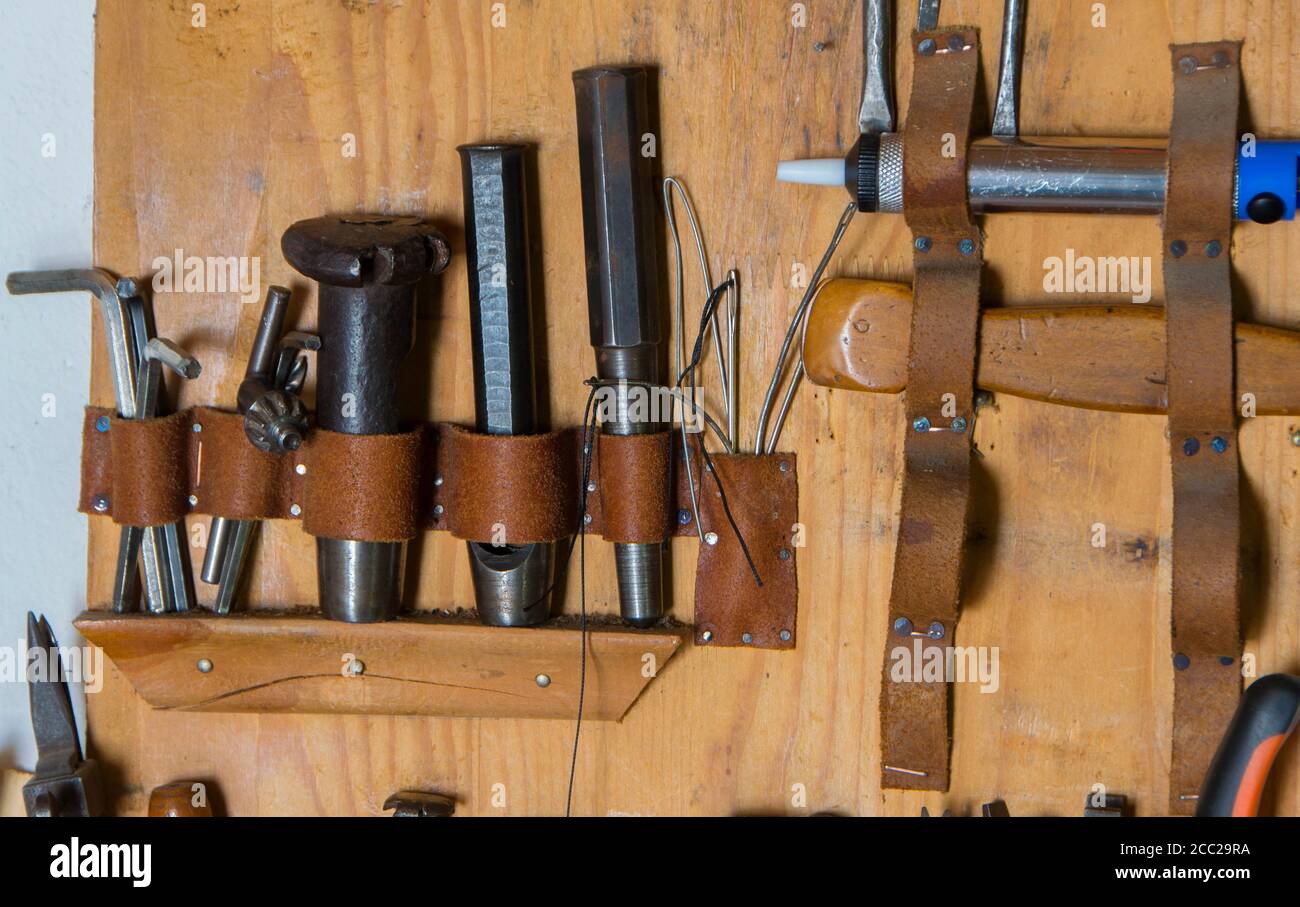 Handmade leather craft tool on the wooden backgrounde Stock Photo - Alamy