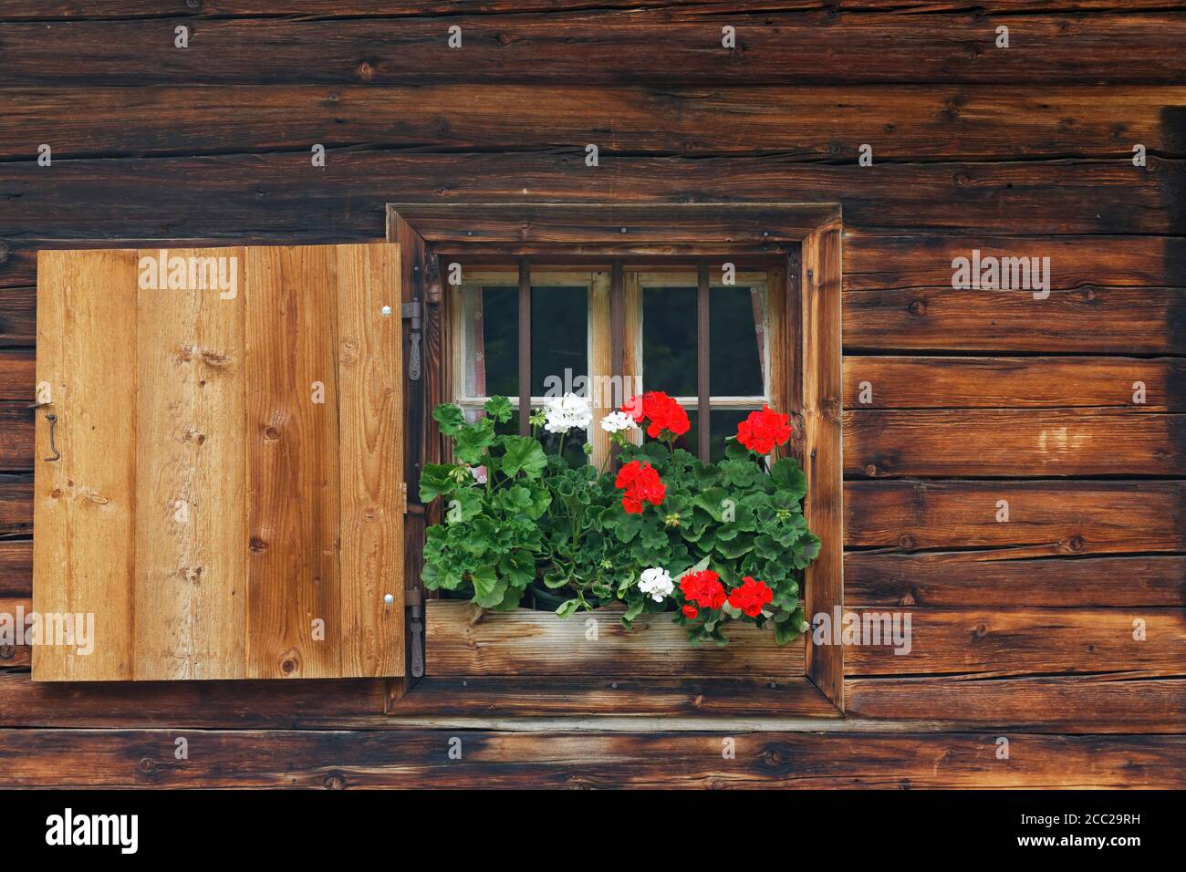 Austria, Tyrol, Window of Alp House Stock Photo - Alamy