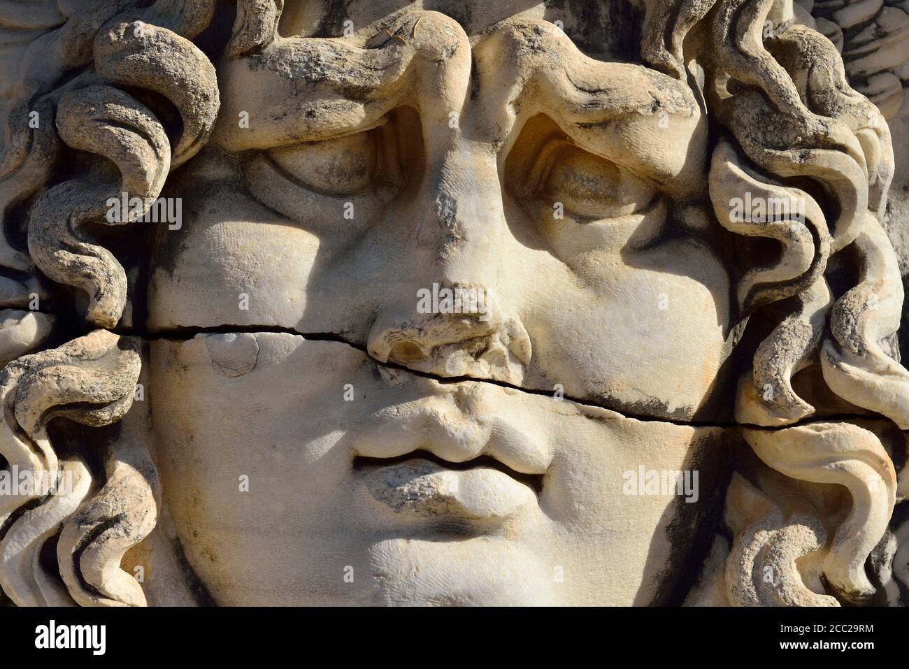 Turkey, Antique gorgon head at Apollon temple Stock Photo - Alamy