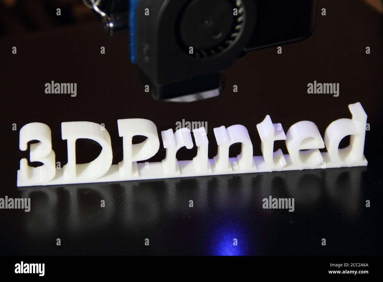 a 3D printer printing the text "3d printed Stock Photo - Alamy