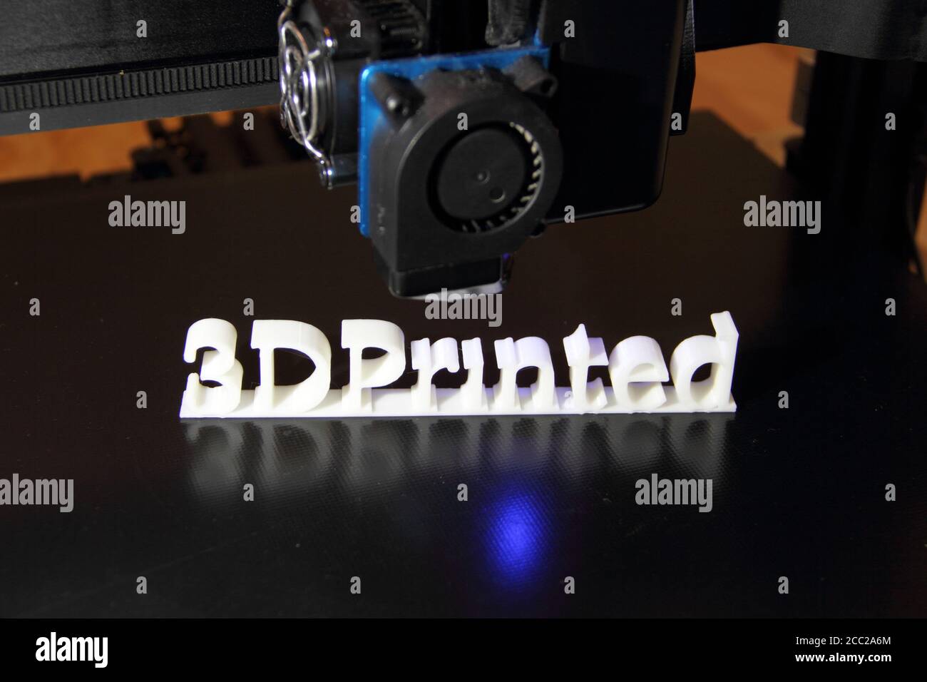 a 3D printer printing the text "3d printed Stock Photo - Alamy