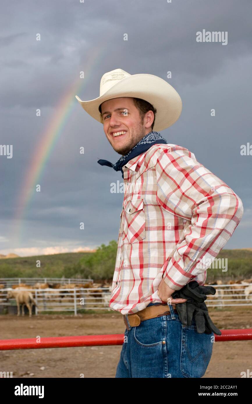 USA, Texas, Dallas, Cowboy standing by pasture, smiling, portrait Stock ...