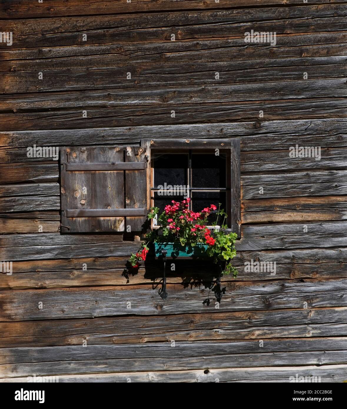 Austria, Krimmler Achental, Alpine hut, window with flowers Stock Photo ...