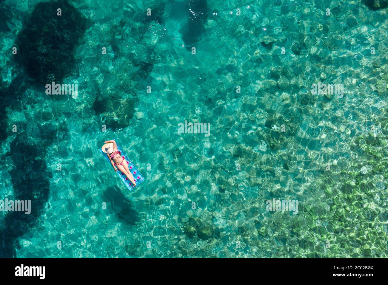 Greece Beach Sunbathing Woman High Resolution Stock Photography and ...