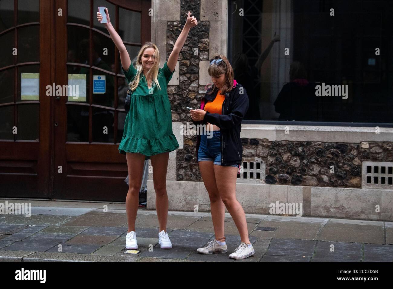 Georgia Hayes (left) celebrates outside the Department for Education in ...