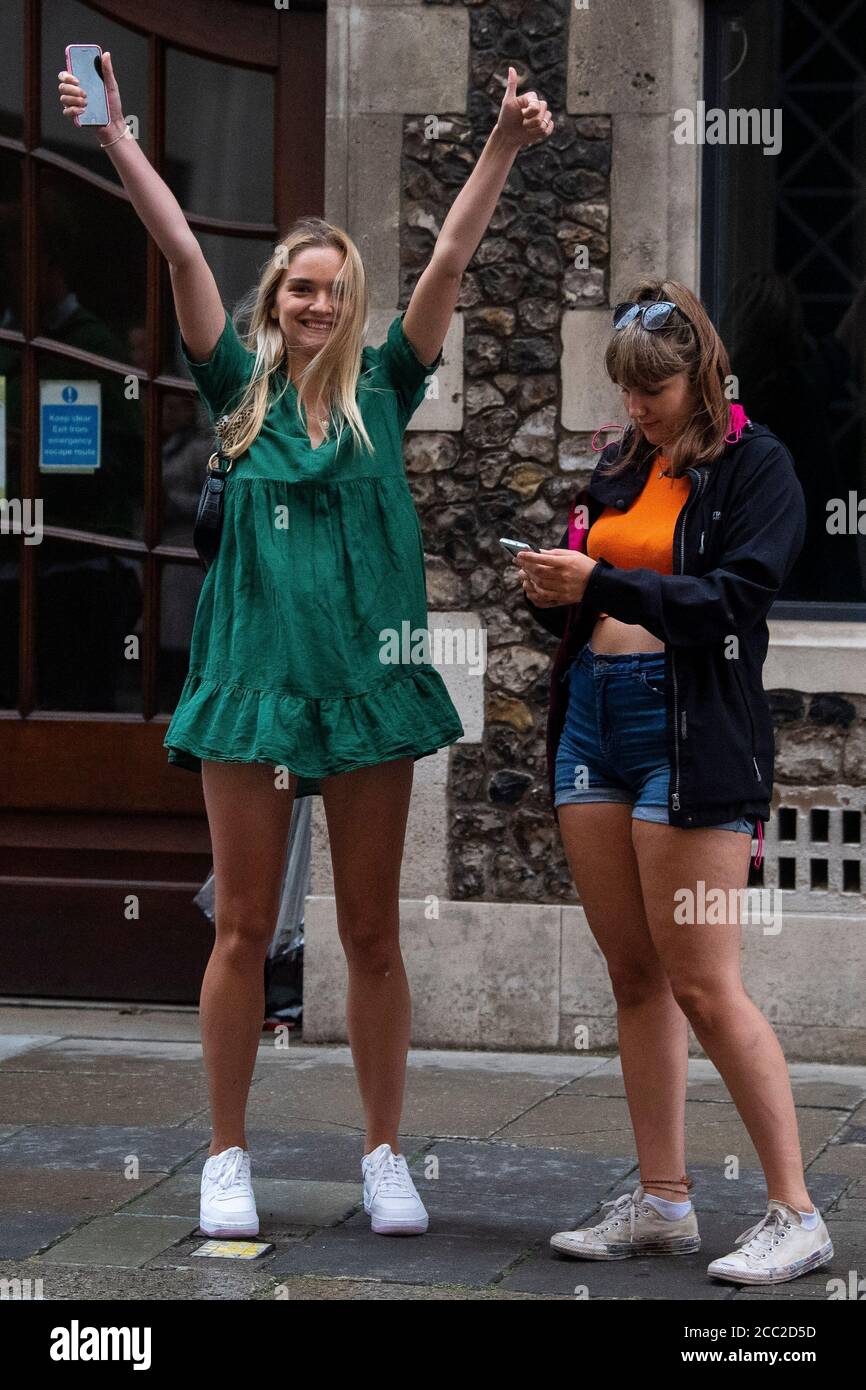 Georgia Hayes (left) celebrates outside the Department for Education in ...