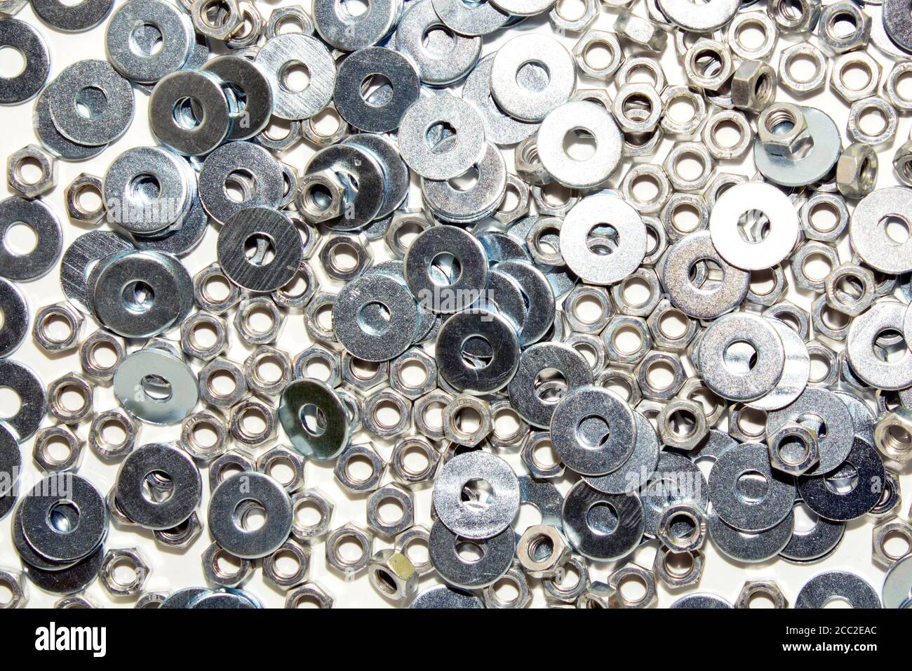 Metal washers on a white background Stock Photo - Alamy