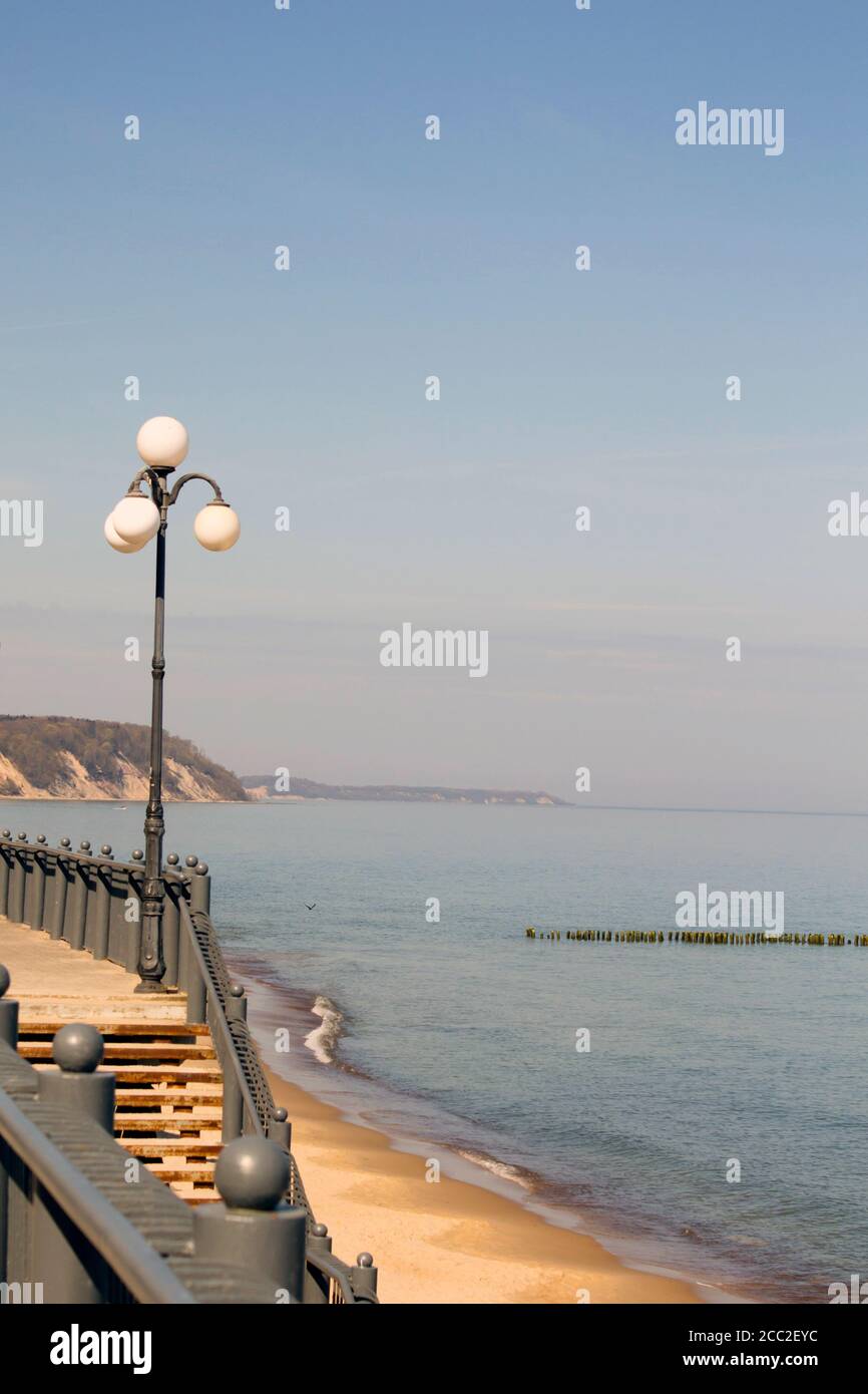 The promenade on the sea, the sun, the water Stock Photo - Alamy