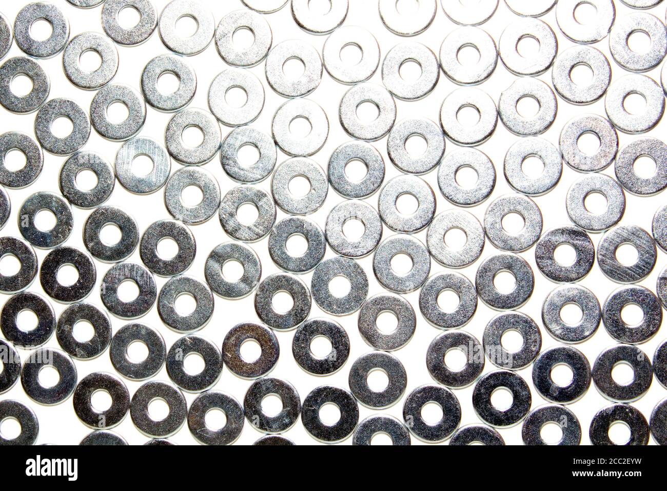 Metal washers on a white background Stock Photo - Alamy