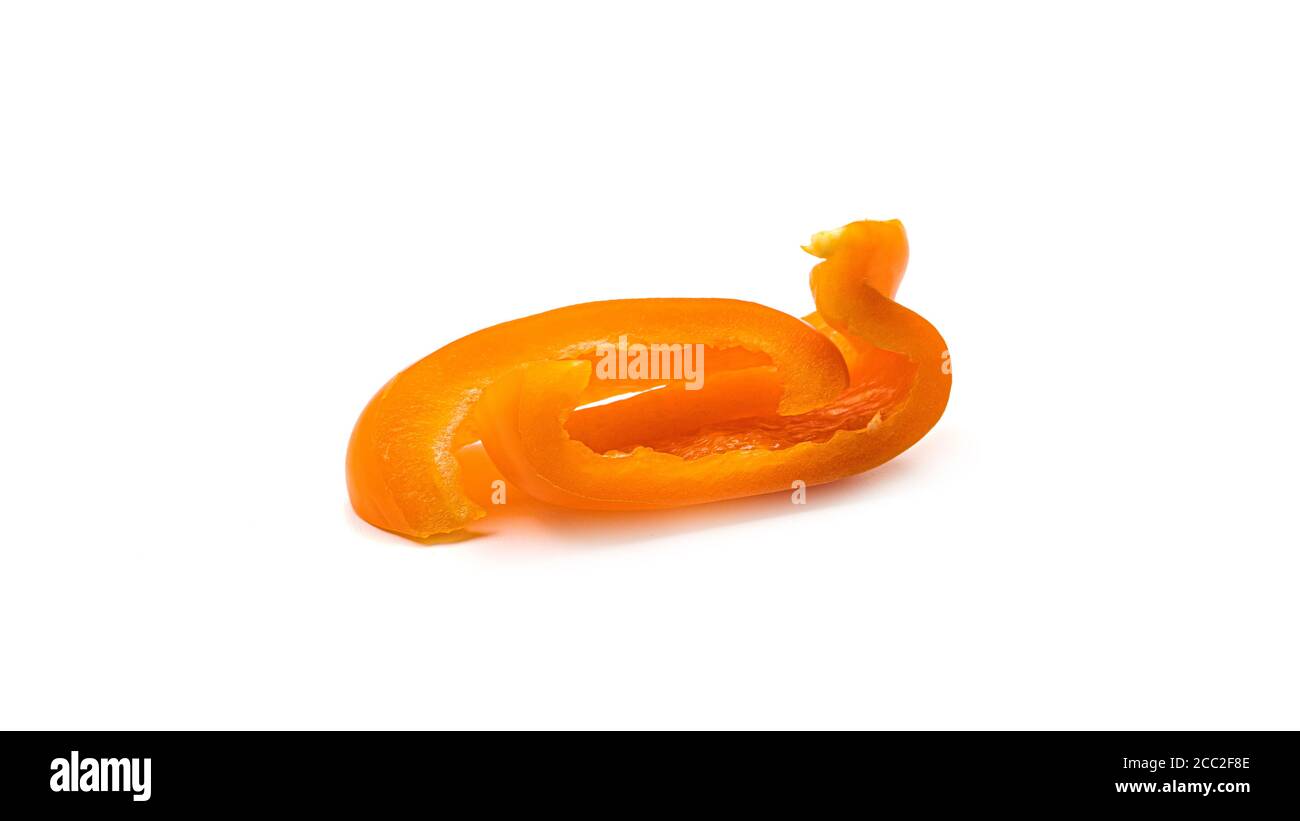 Slices of sweet orange bell pepper on white background Stock Photo - Alamy