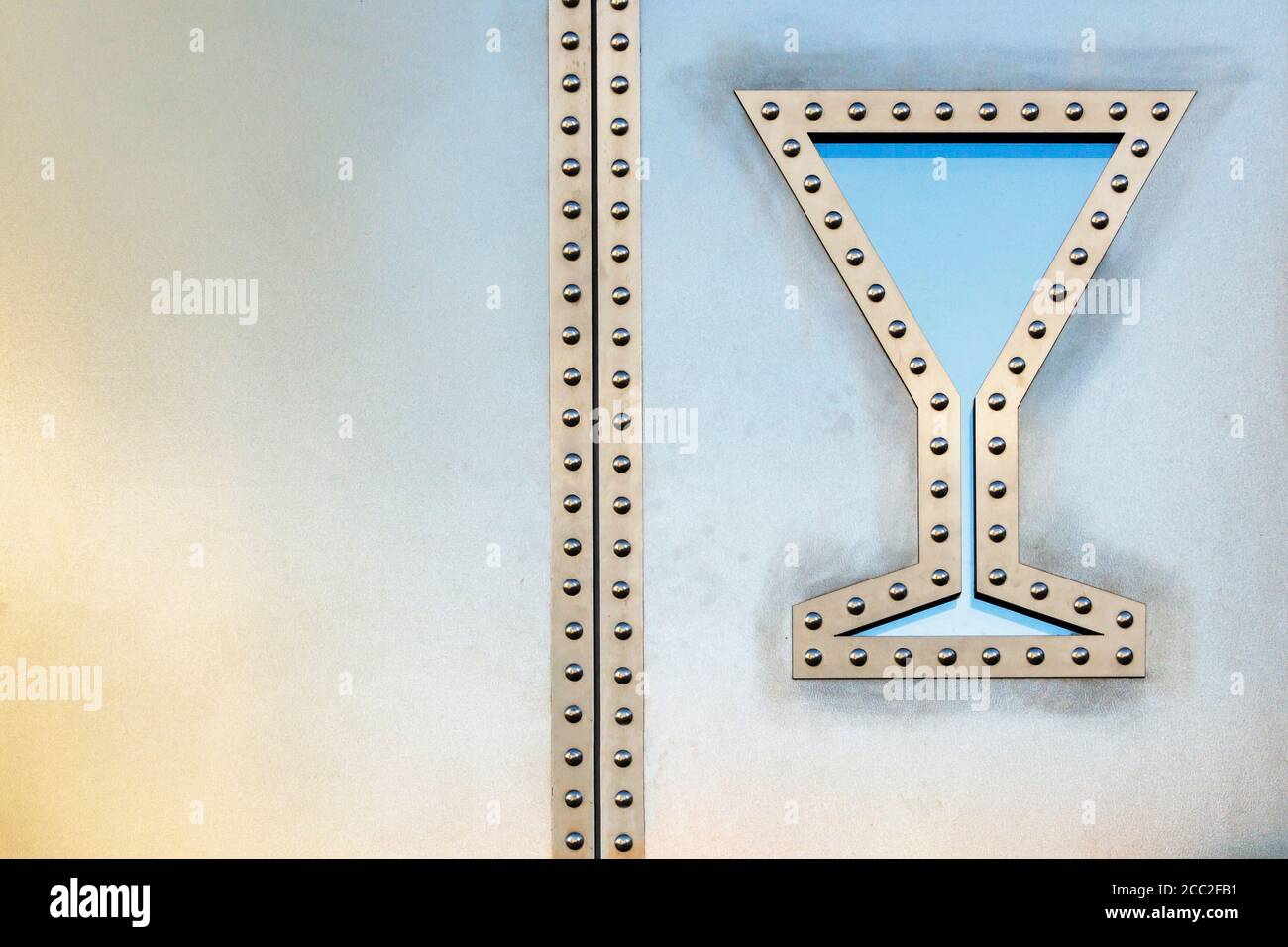 metal background with rivets and image of a shot glass on it Stock ...