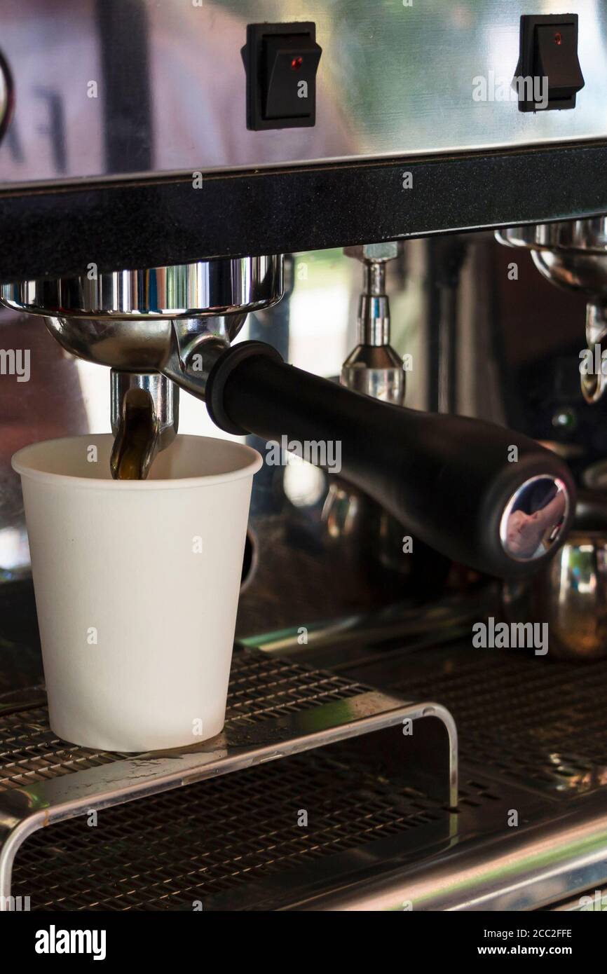 Coffee pouring from machine hi-res stock photography and images - Alamy