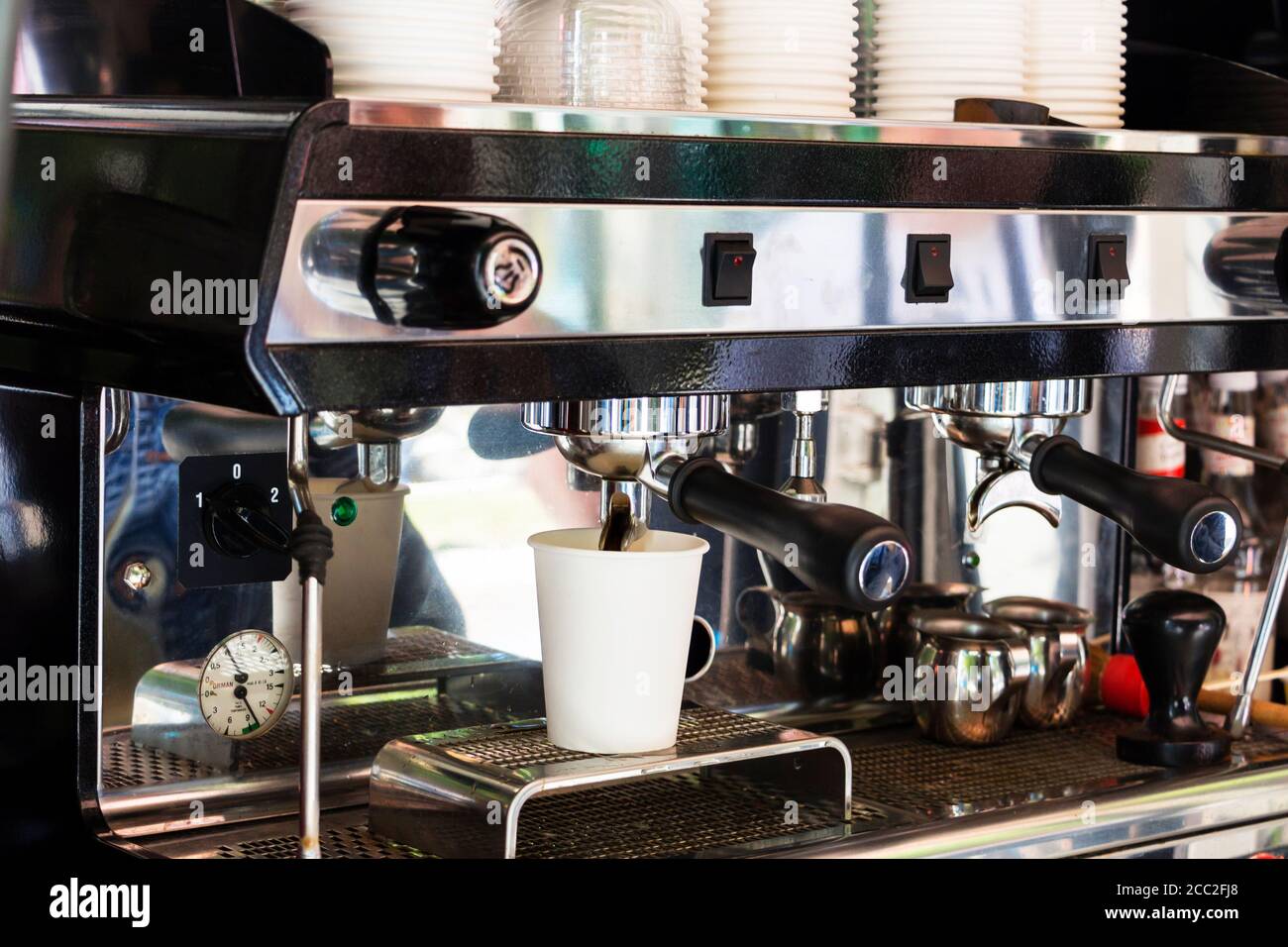 Hand pouring machine hi-res stock photography and images - Alamy